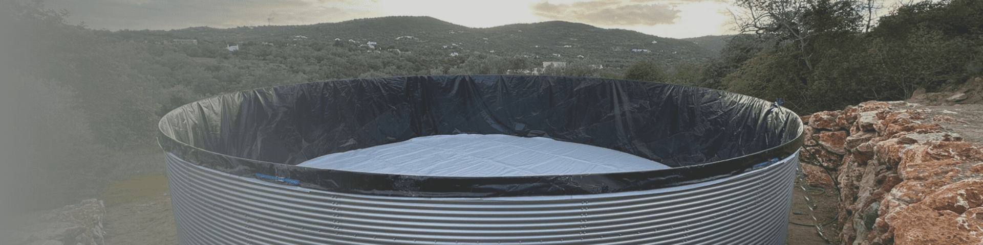Rainwater harvesting silo for self-sufficient property, Portugal - NPI ...